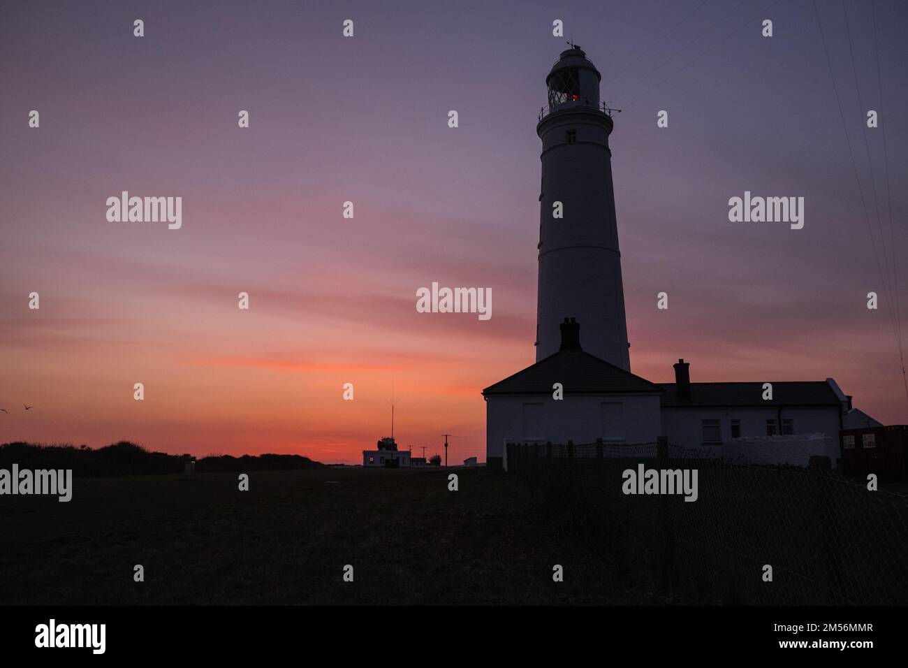 At,sunset.For 175 years Nash Point lighthouse, designed by James Walker ...