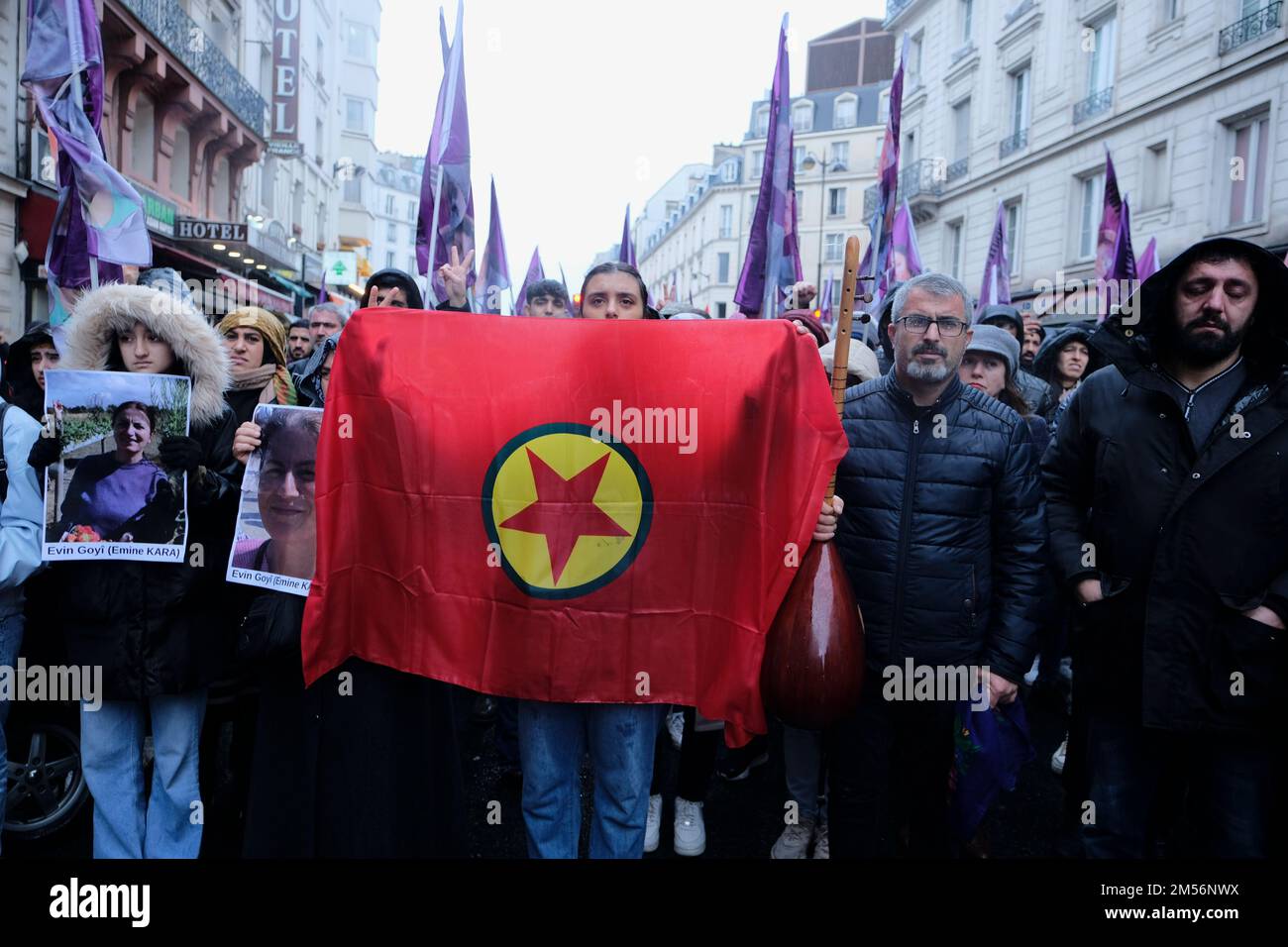 Paris, Ile de France, FRANCE. 26th Dec, 2022. A woman holds the flag of ...