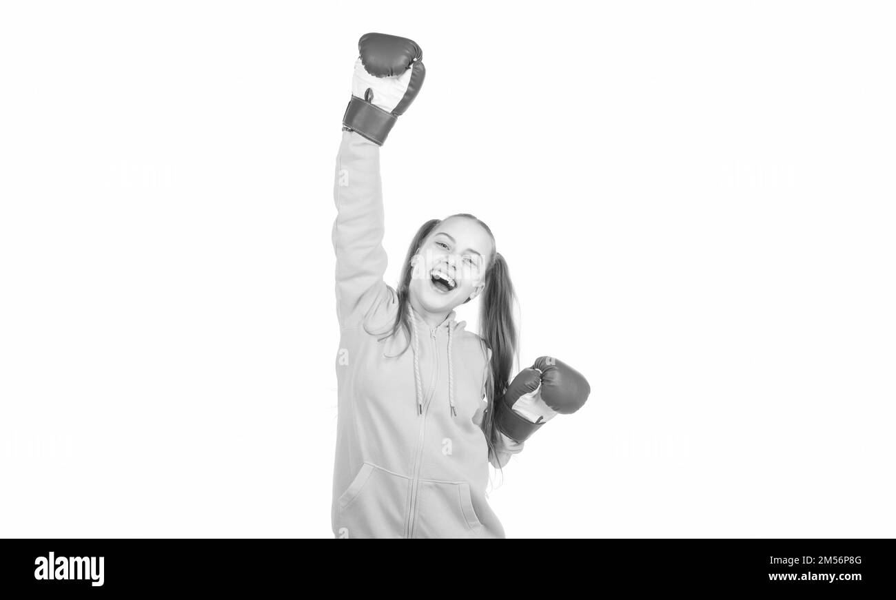 happy child boxer in boxing gloves celebrating victory in fight ...