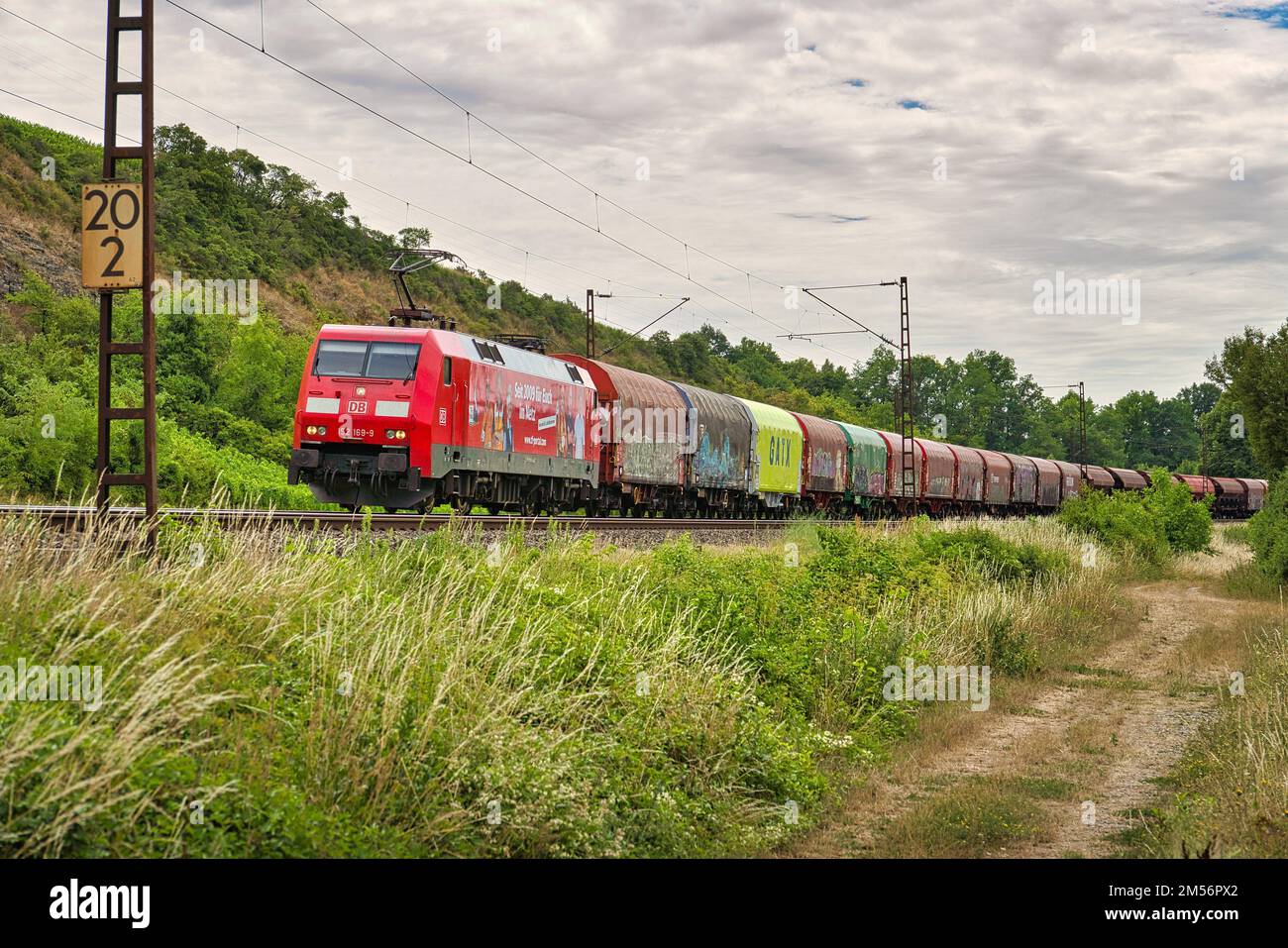 The DB Cargo class electric locomotive driving over the railway tracks ...