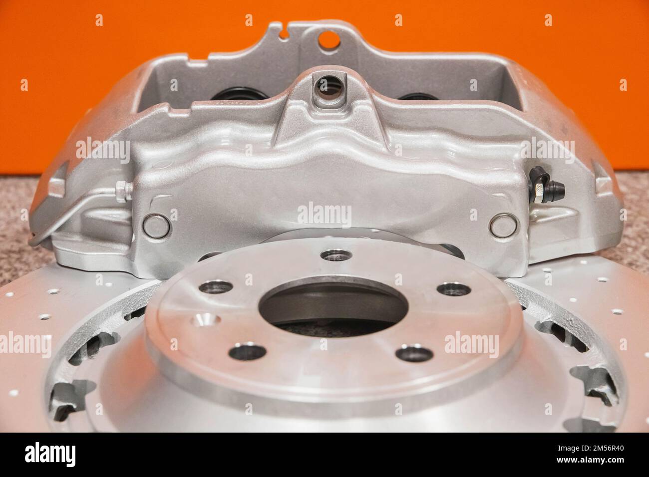 steel brake disc and Gray lie on the table in the workshop Stock Photo ...