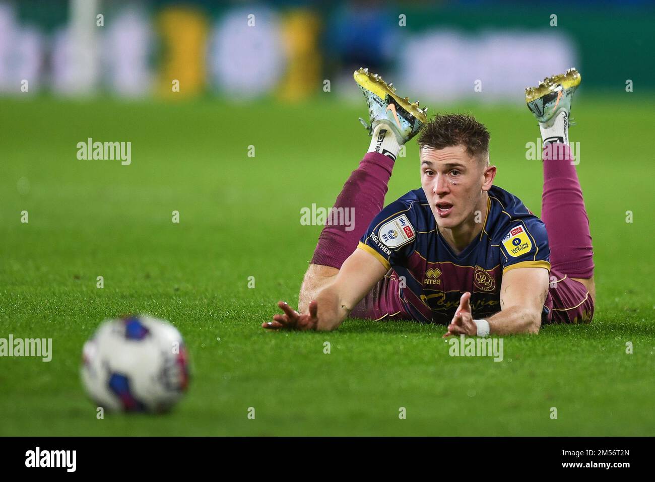 Mahlon Romeo #2 of Cardiff City fouls Jimmy Dunne #3 of QPR during the ...