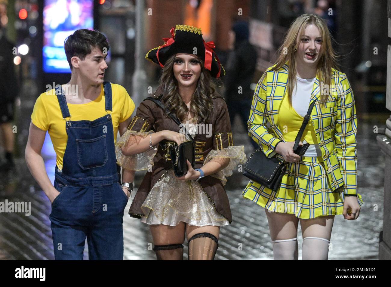 King Street, Wigan, December 26th 2022. - Revellers in various fancy ...