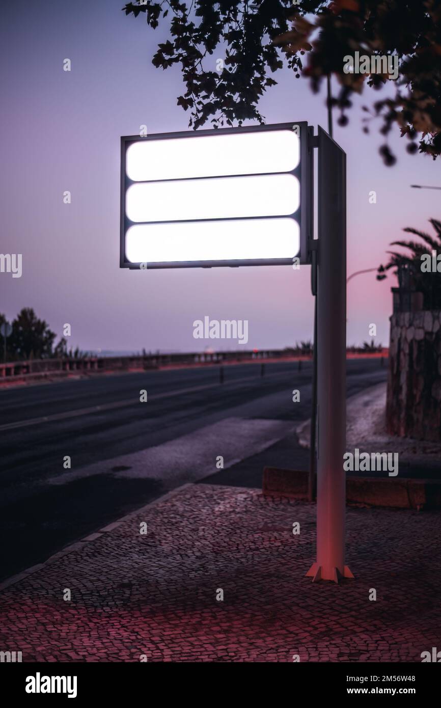 A vertical selective focus capture of three empty white color street ...