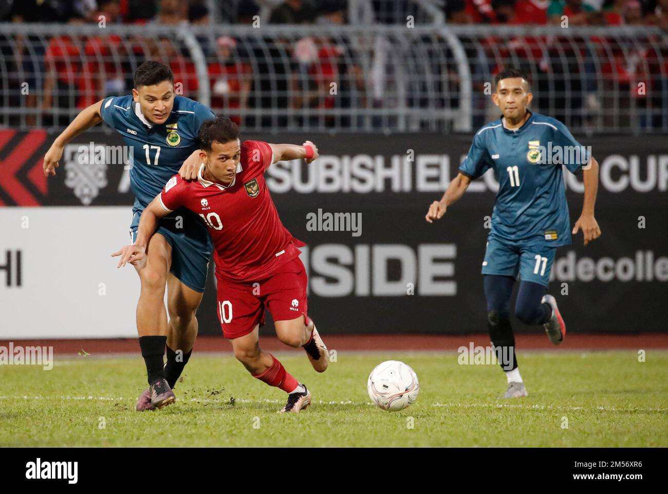 Egy Maulana Vikri of Indonesia (C) and Wafi Aminuddin (L), Najib Tarif ...