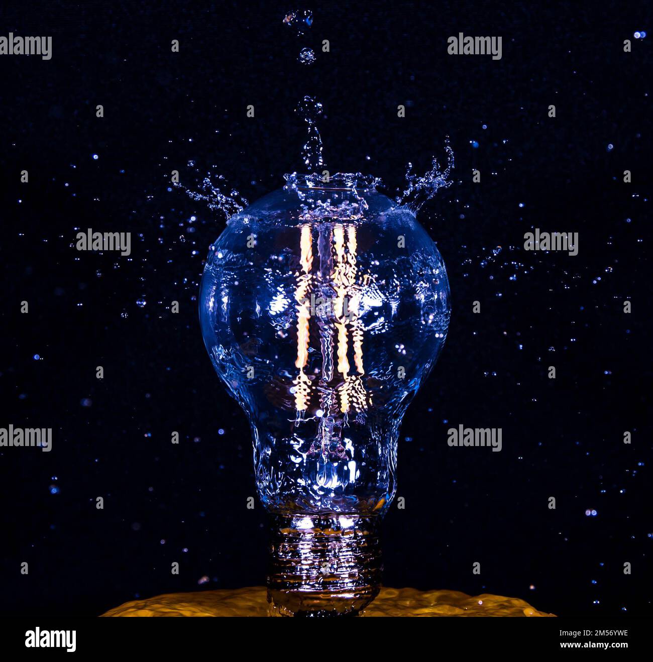 The water falling on a Light bulb Stock Photo - Alamy