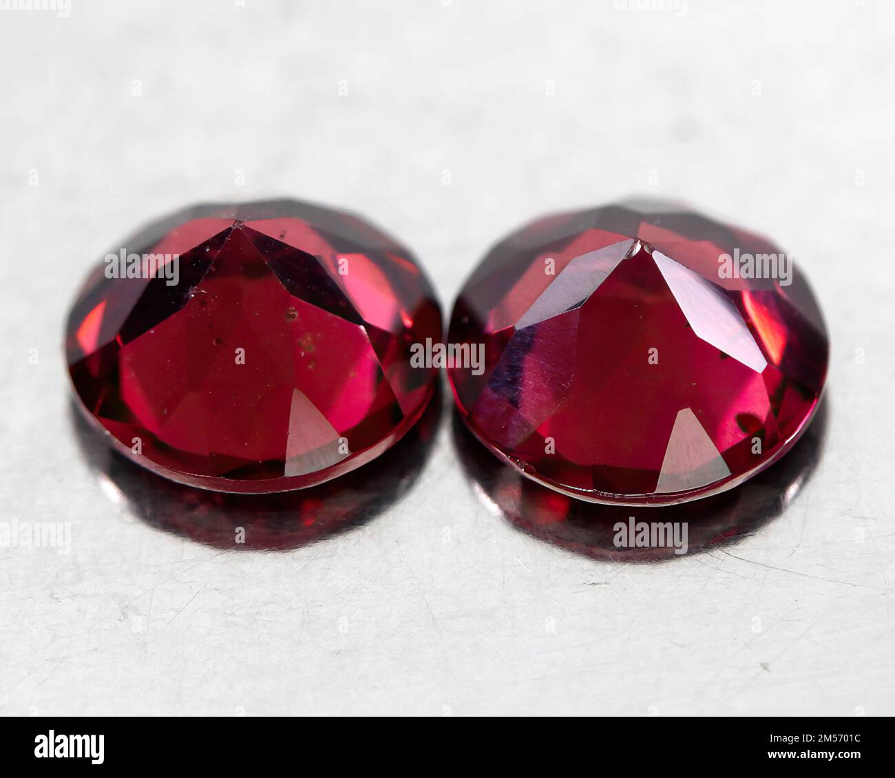 Natural gemstone rhodolite garnet isolated on white background Stock ...