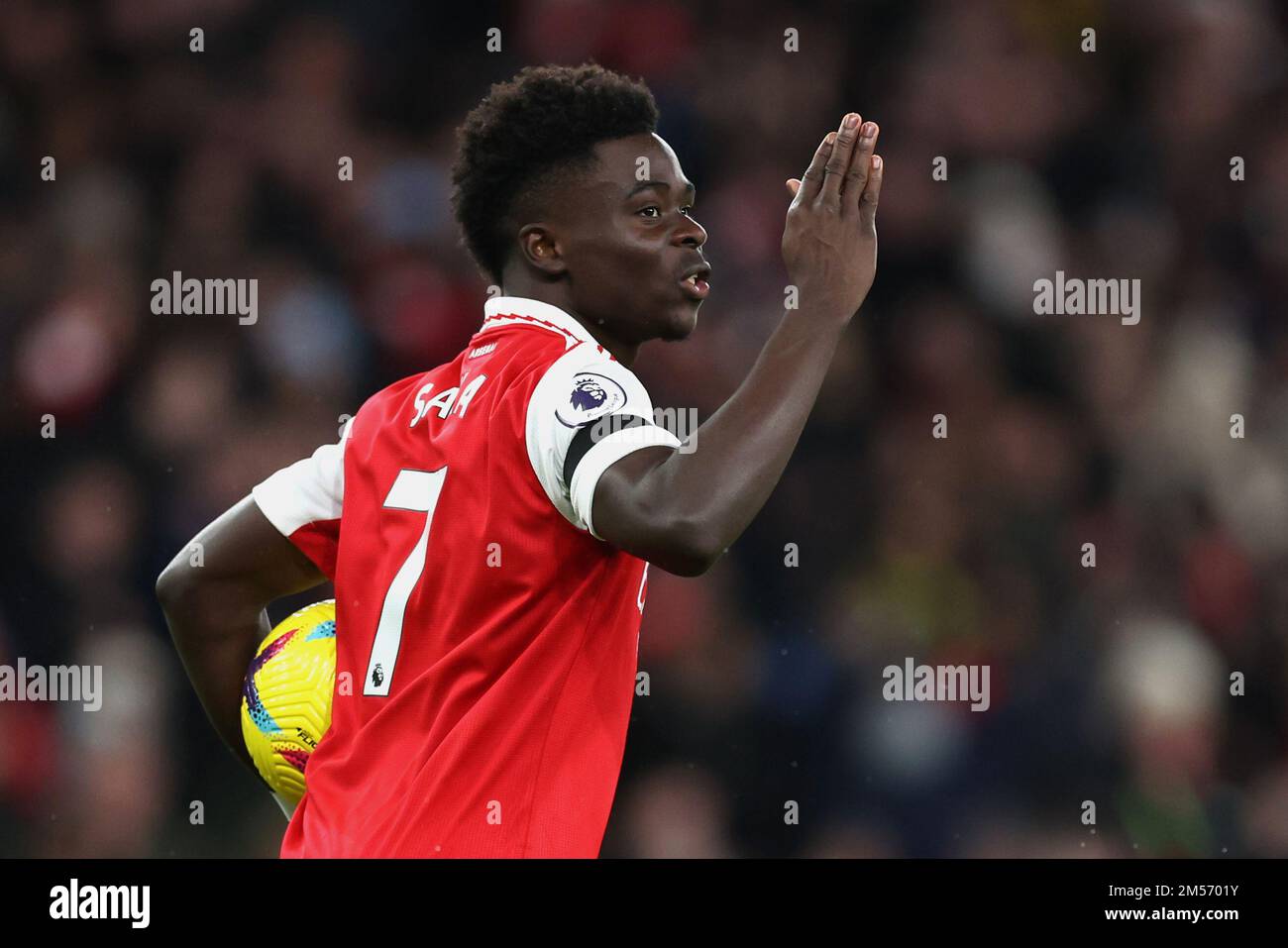 Arsenal's Bukayo Saka celebrates scoring their side's first goal of the ...