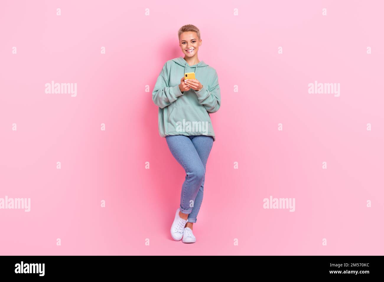 Full length photo of adorable pretty lady use quality device promoting ...