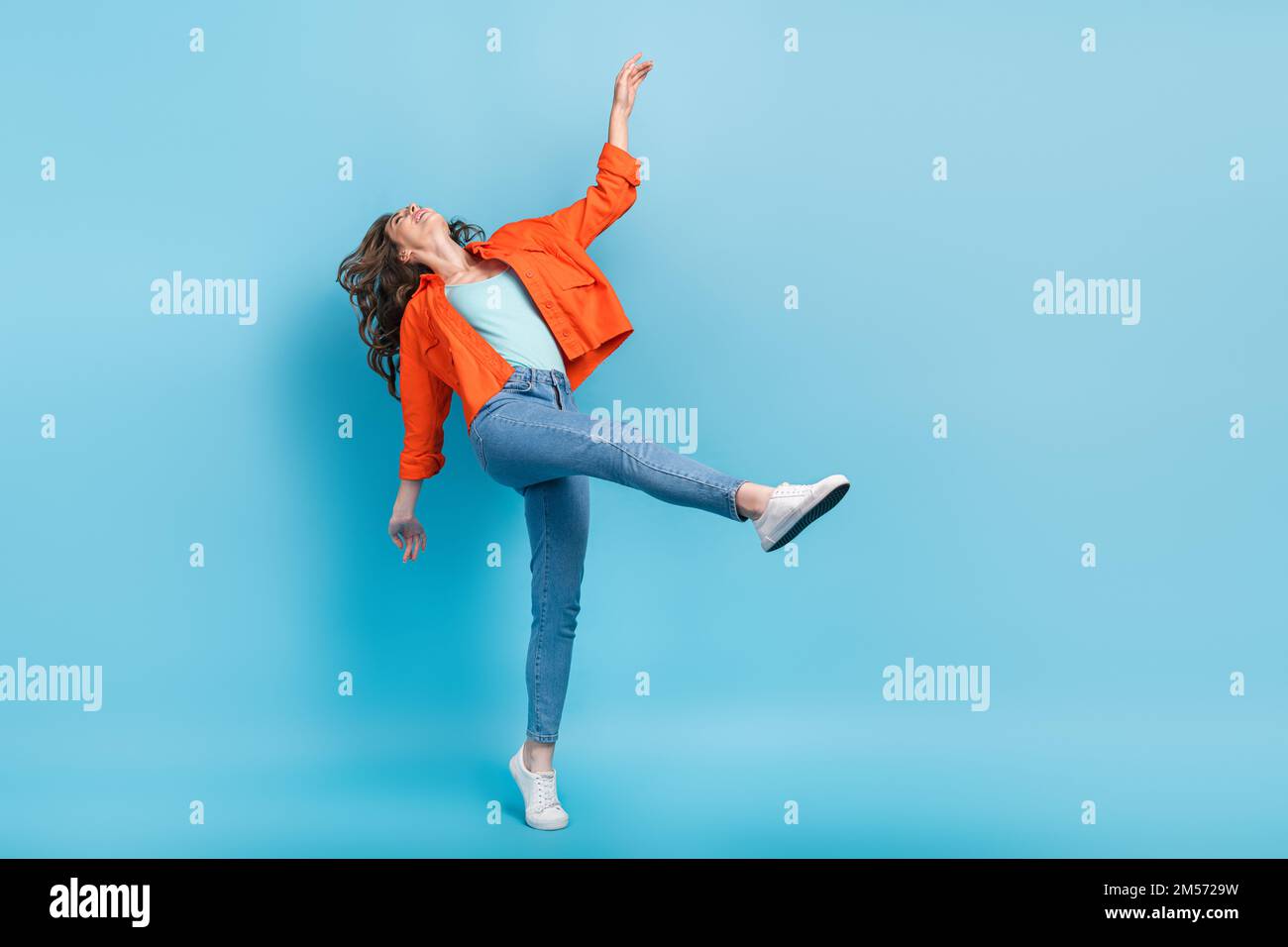 Full length photo of young attractive woman energetic crazy dance ...