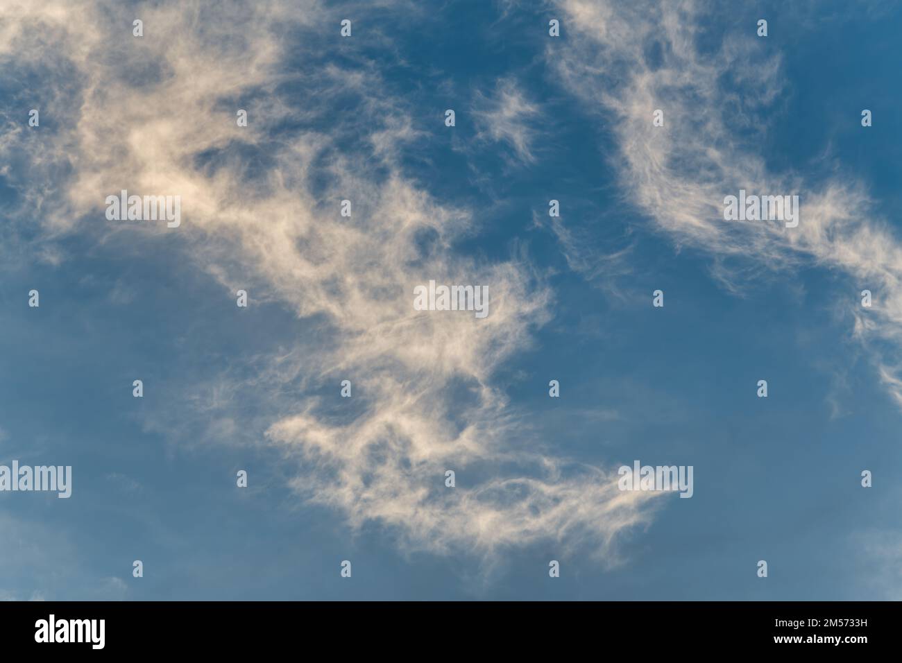 A Detailed Image Of White Wispy Cirrus Clouds Set Against A Blue ...