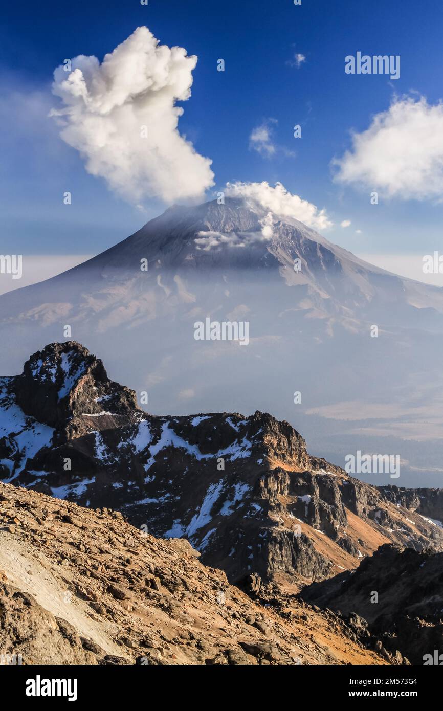 Smoking Popocatepetl volcano in central Mexico from Iztaccihuatl Stock ...