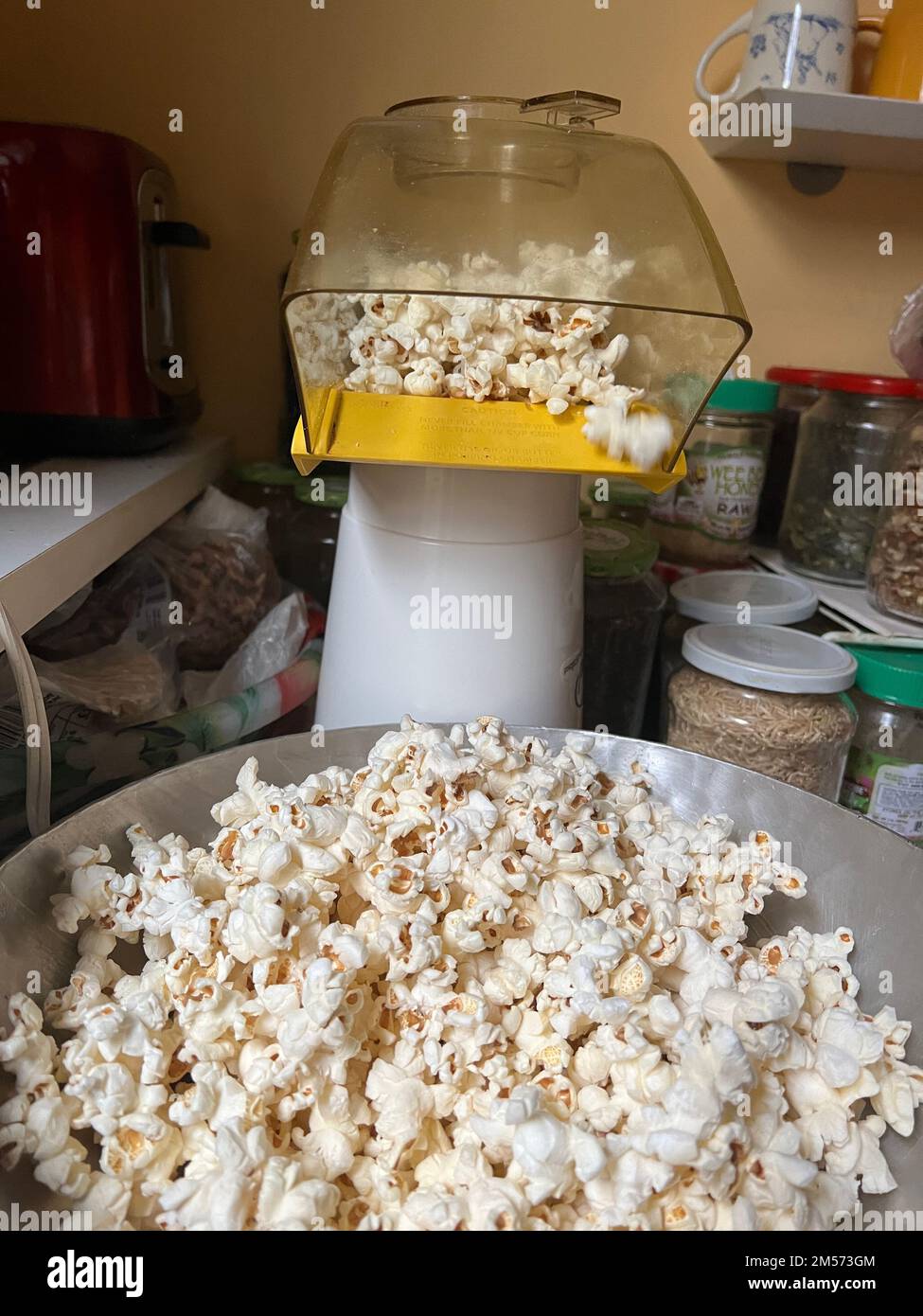 Popcorn popper making popcorn at home in Brooklyn, New York Stock Photo ...