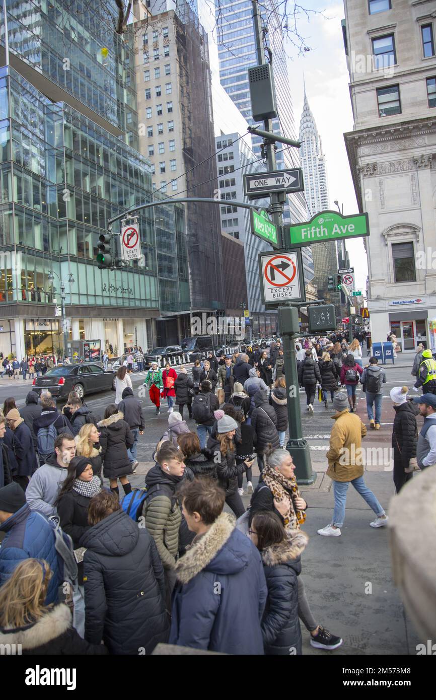 crowds on the corner of 5th Avenue and 42nd Street a week before ...