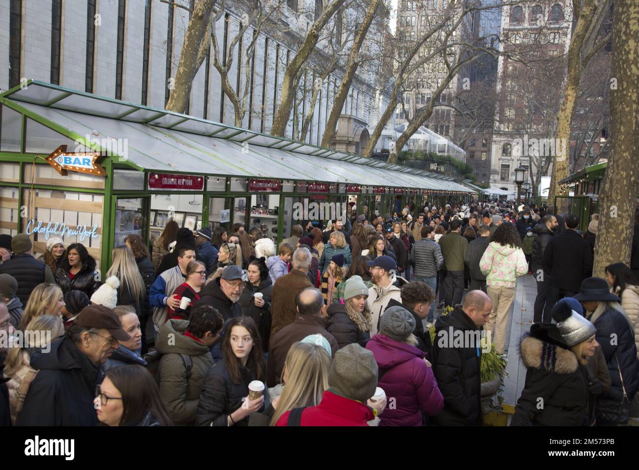 Crowds of people at the holiday shopping village at Bryant Park a week ...