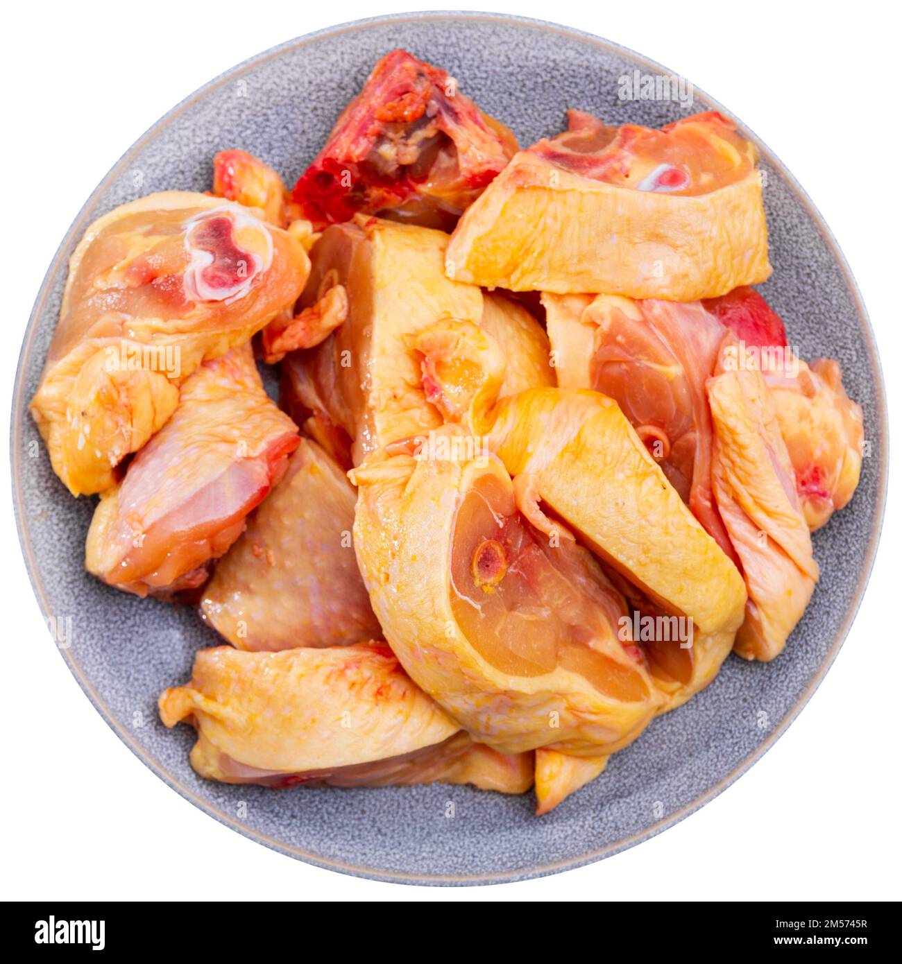 Bowl with raw sliced chicken, food preparation Stock Photo - Alamy