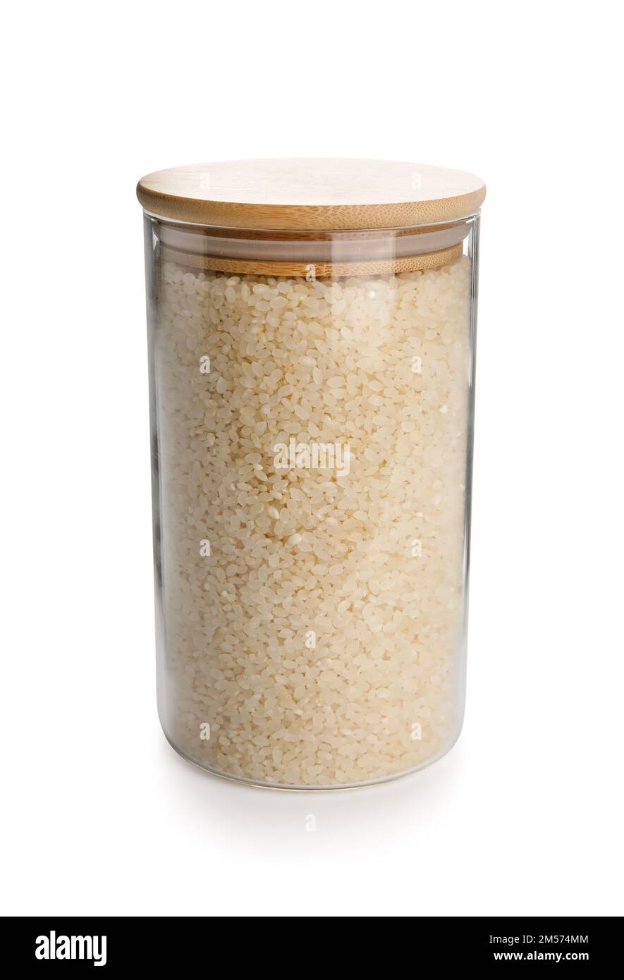 Glass jar of rice on white background Stock Photo - Alamy