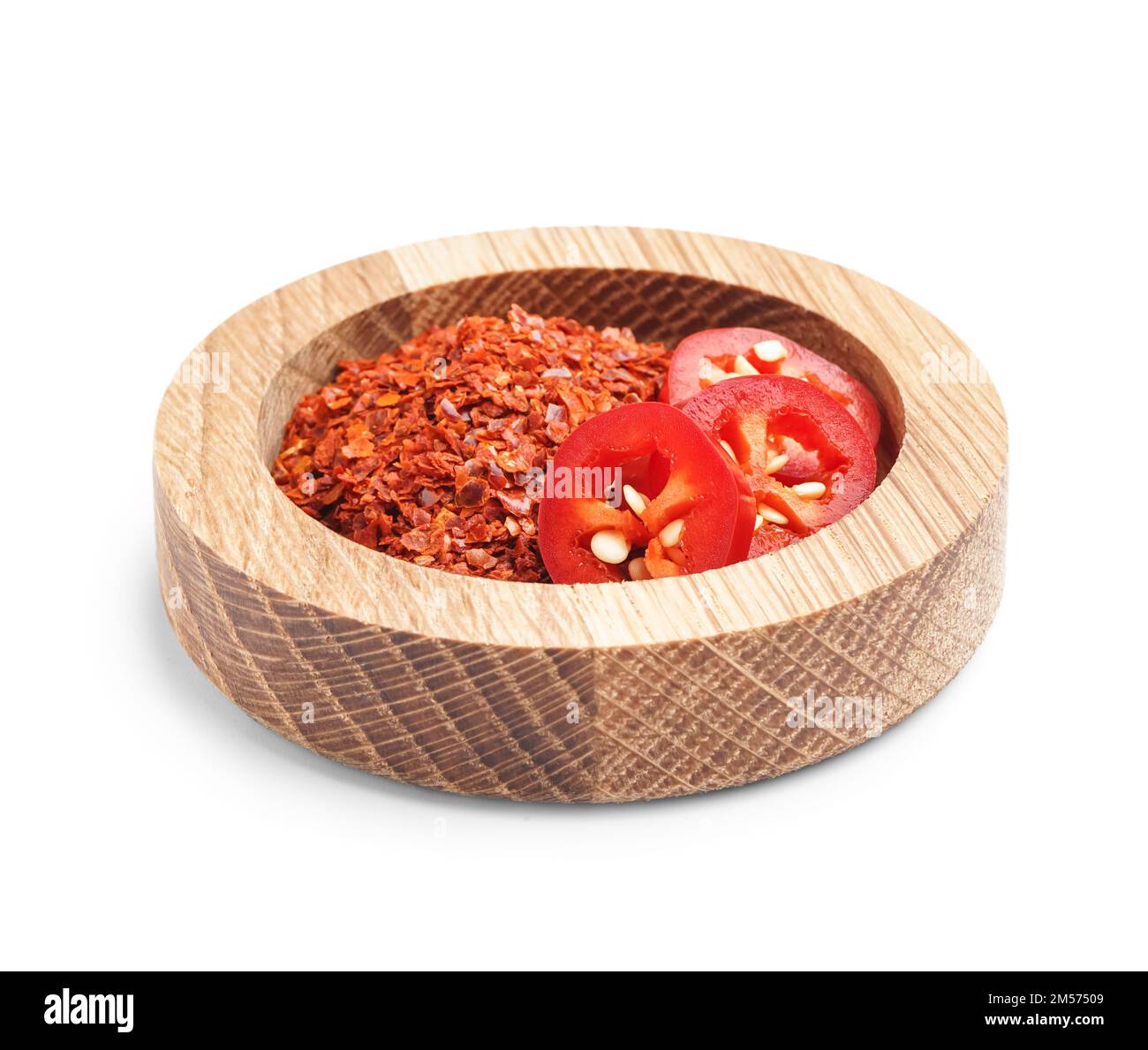 Wooden bowl of chipotle chili flakes isolated on white background Stock ...