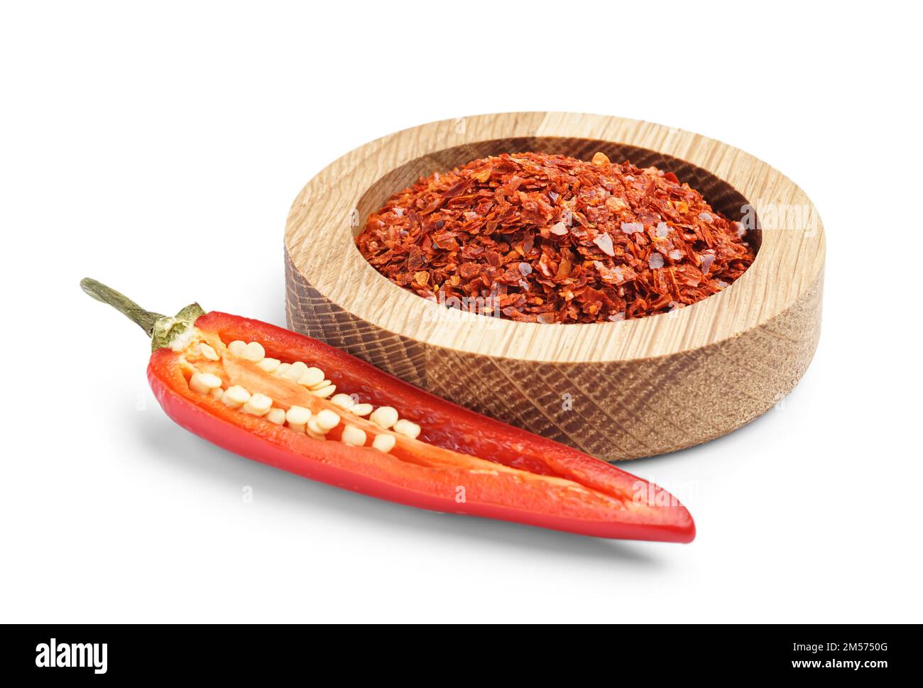 Wooden bowl of chipotle chili flakes isolated on white background Stock ...