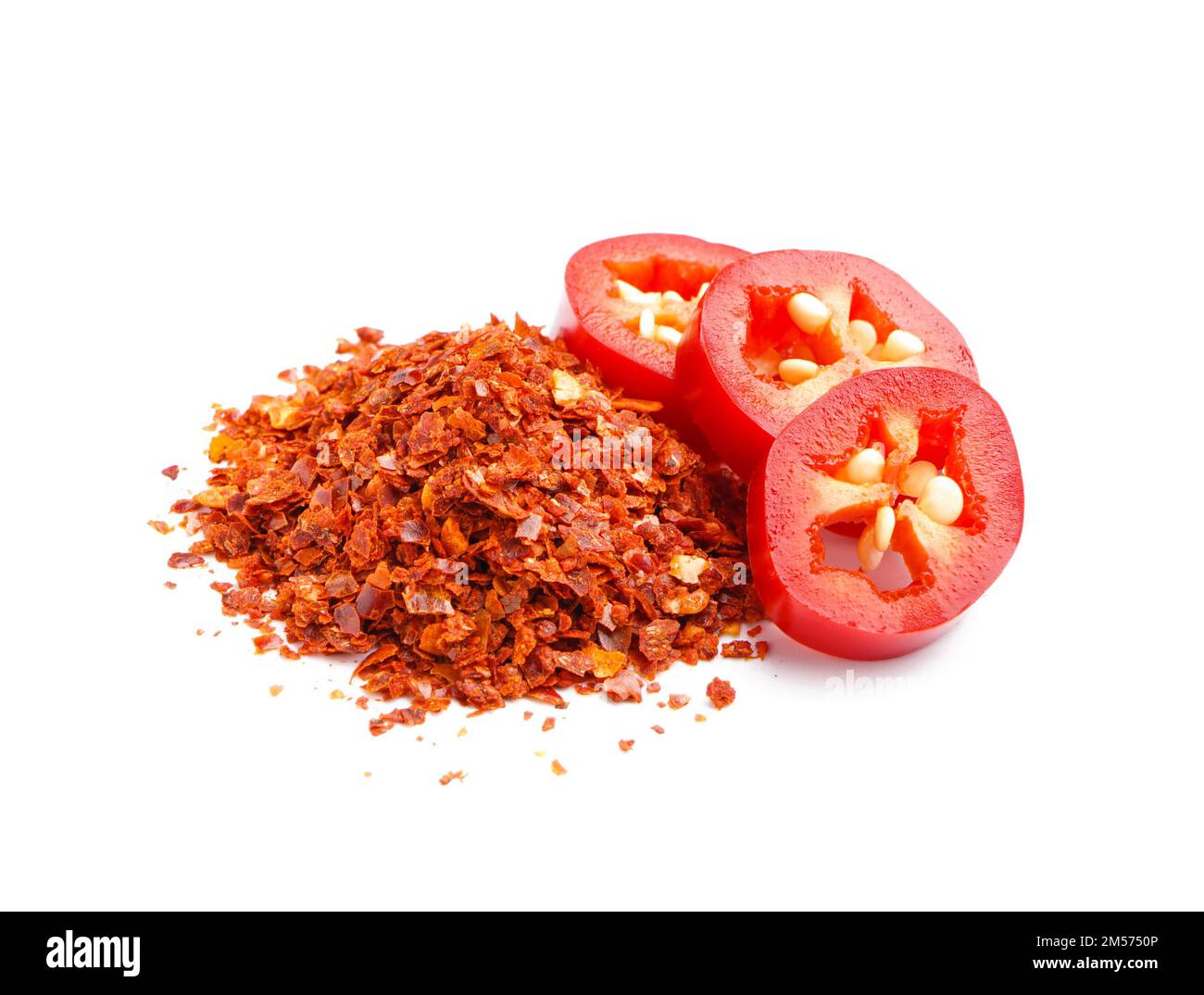 Slices of fresh jalapeno pepper and chipotle chili flakes on white ...