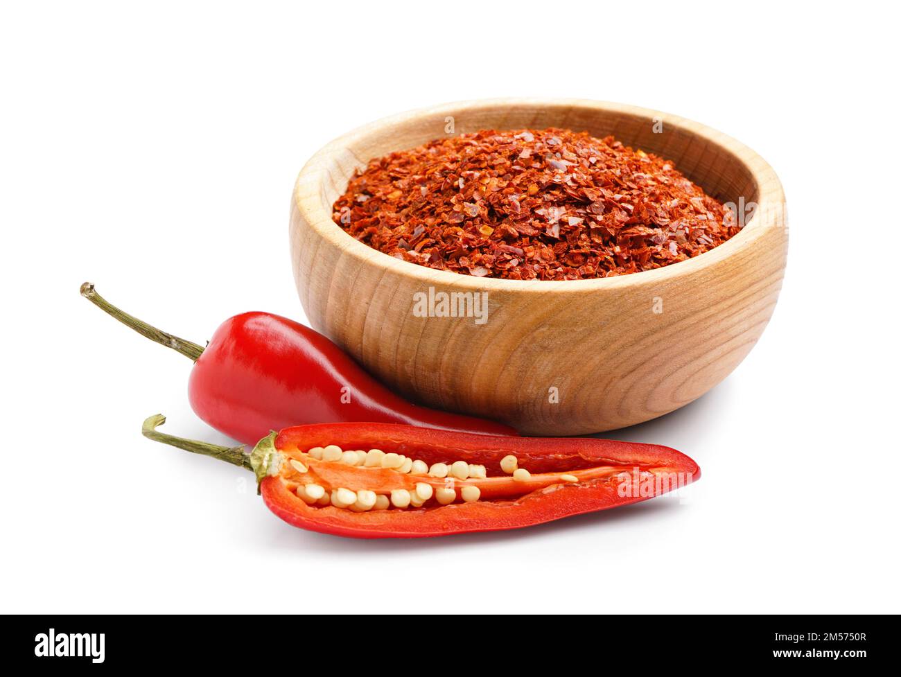 Wooden bowl of chipotle chili flakes on white background Stock Photo ...