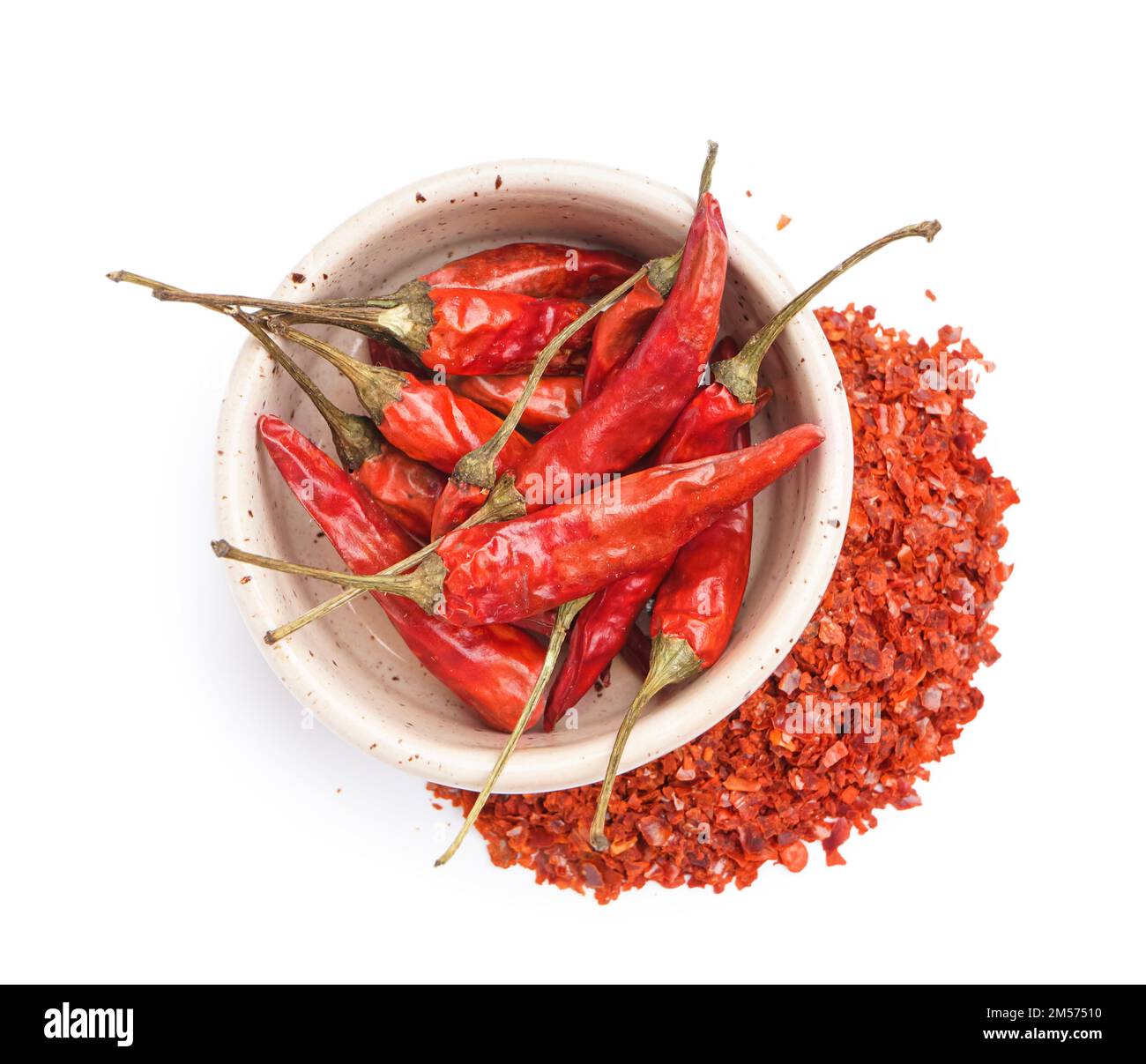 Bowl of chipotle jalapeno peppers and flakes on white background Stock ...