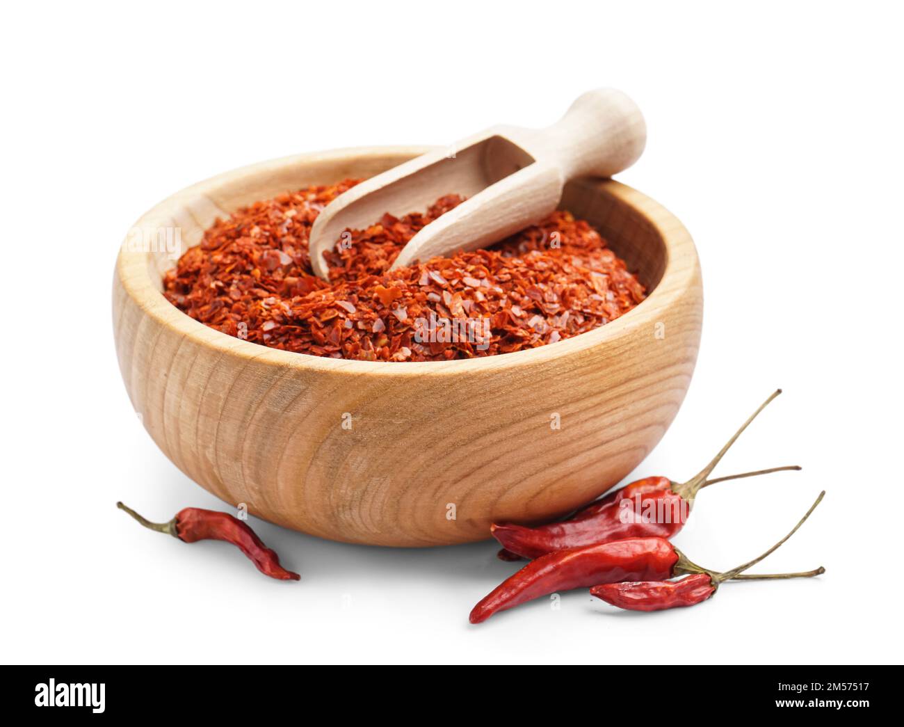 Wooden bowl of chipotle chili flakes on white background Stock Photo ...