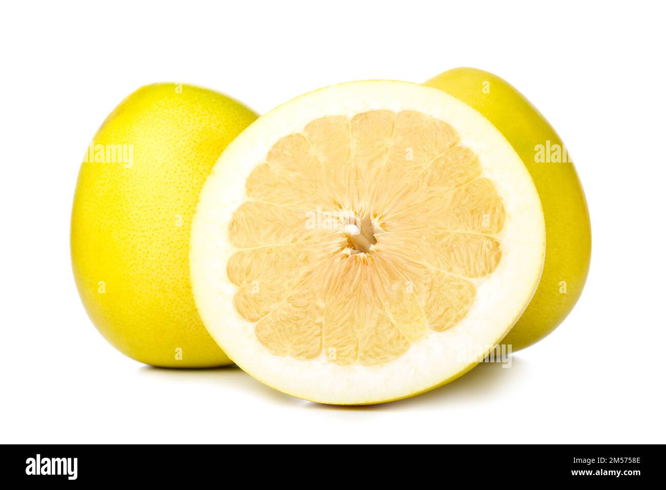 Whole and cut sweet ripe pomelo fruits on white background Stock Photo ...