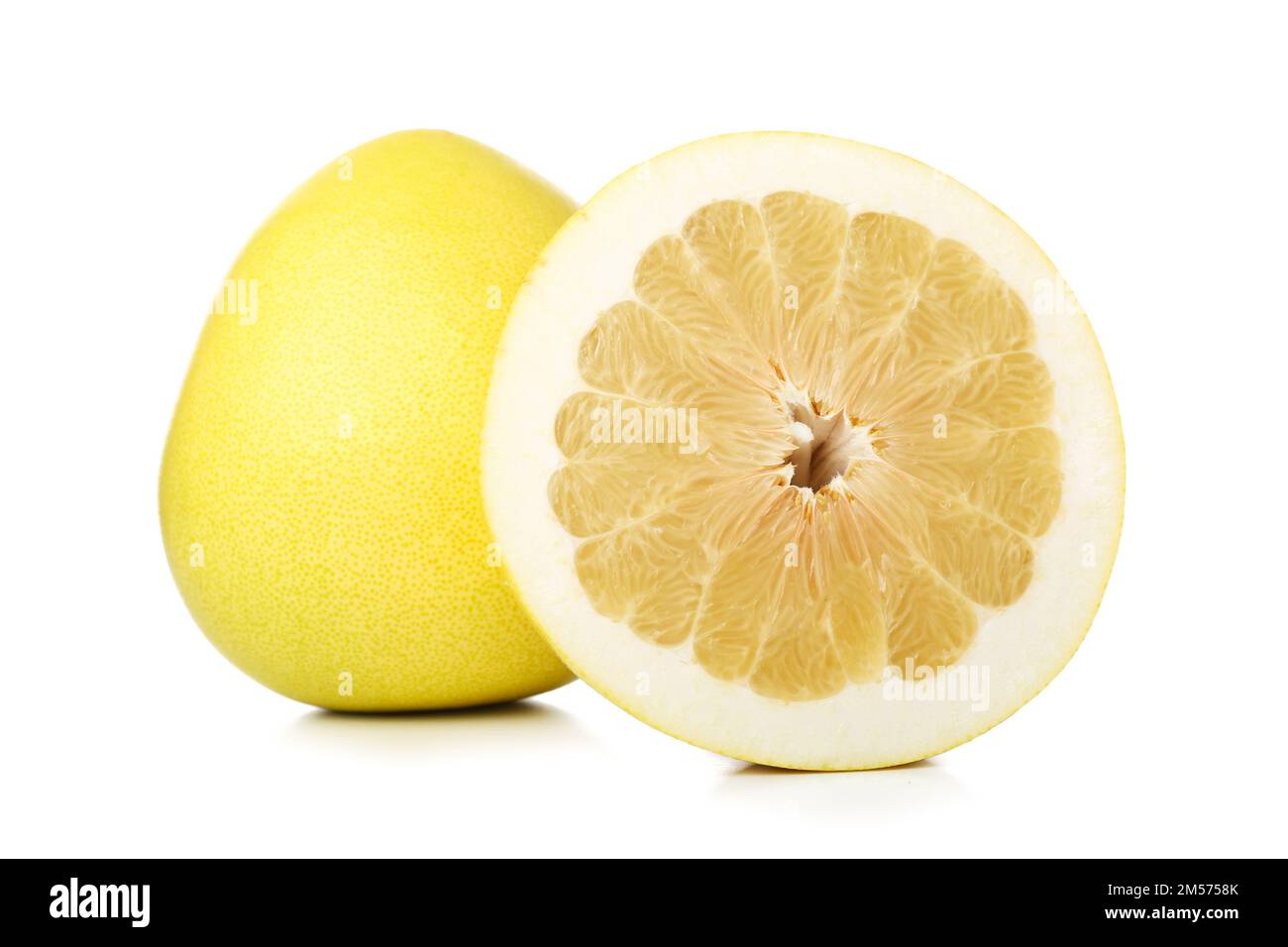 Whole and cut sweet ripe pomelo fruits on white background Stock Photo ...