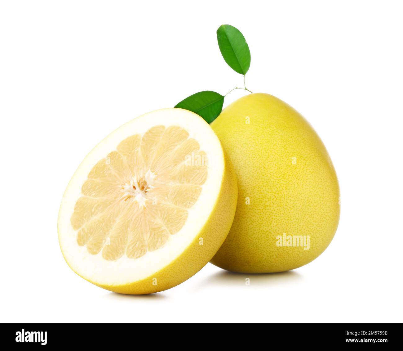 Whole and cut sweet ripe pomelo fruits on white background Stock Photo ...