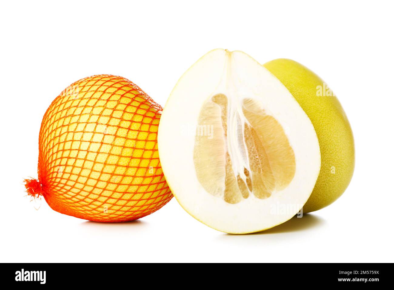 Whole and cut sweet ripe pomelo fruits on white background Stock Photo ...