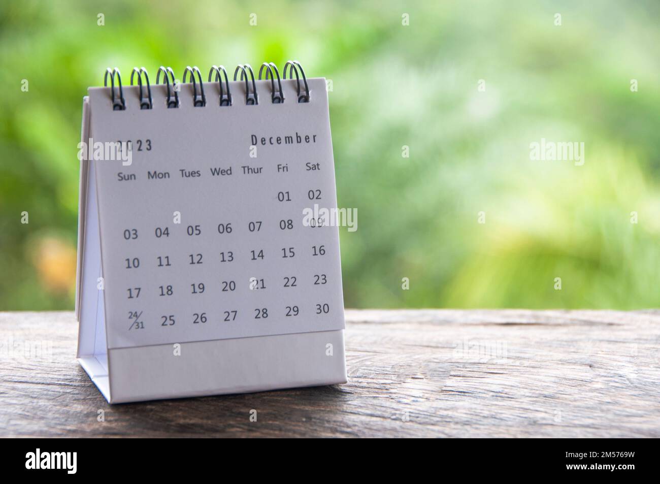 December 2023 table calendar with customizable space for text or ideas ...