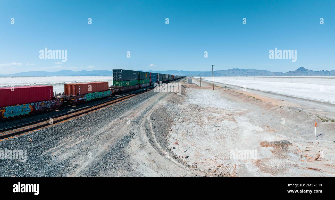 Cargo train passing by the desert Nevada, USA near Salt Flats Stock ...
