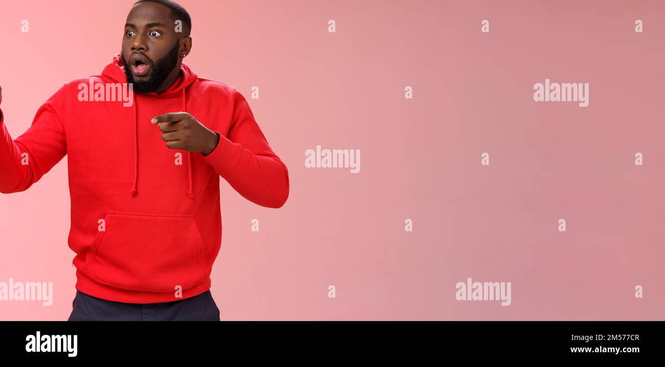 Shocked stunned man widen eyes gasping drop jaw standing stupor ...