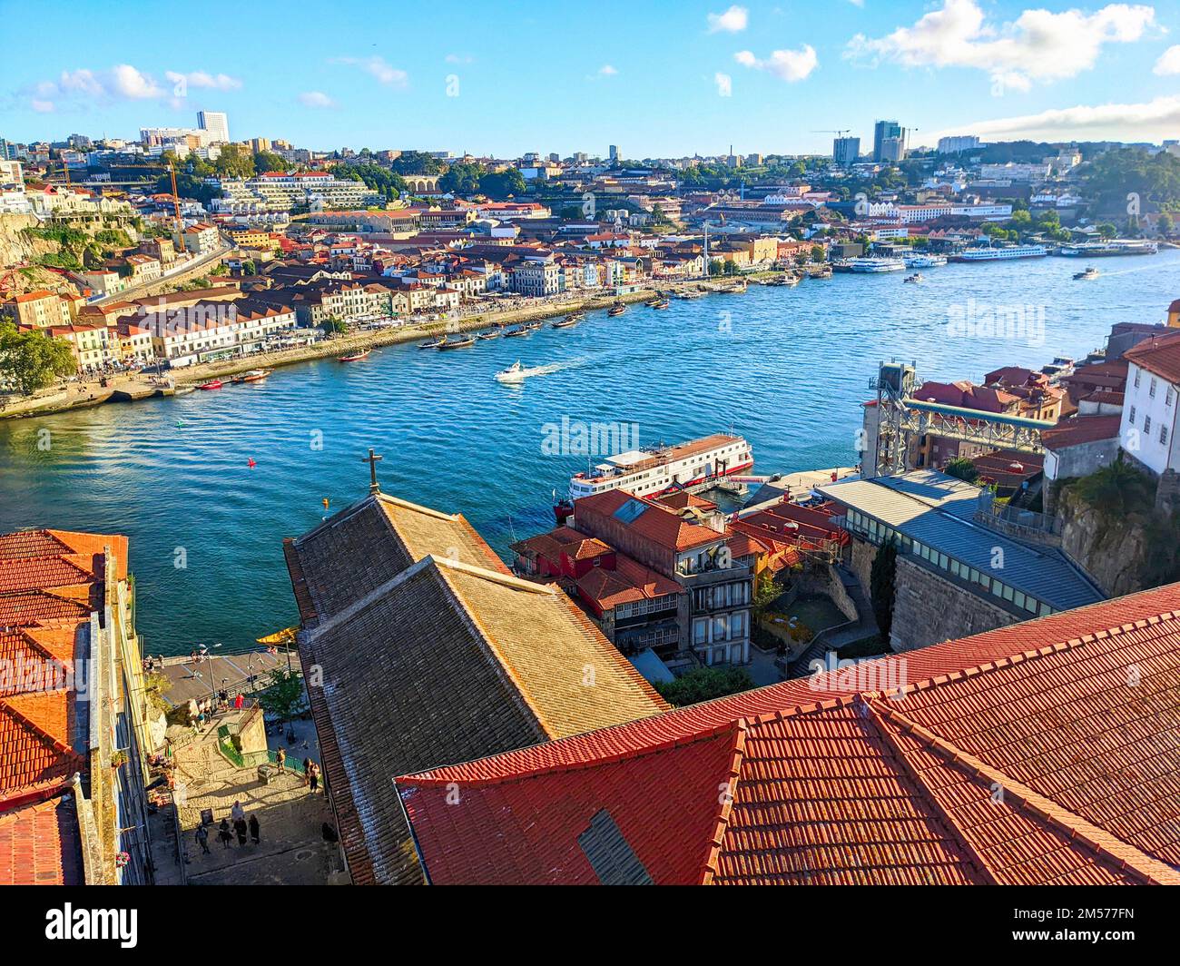 Porto skyline in bright sunshine from above, Ribeira rooftops and ...