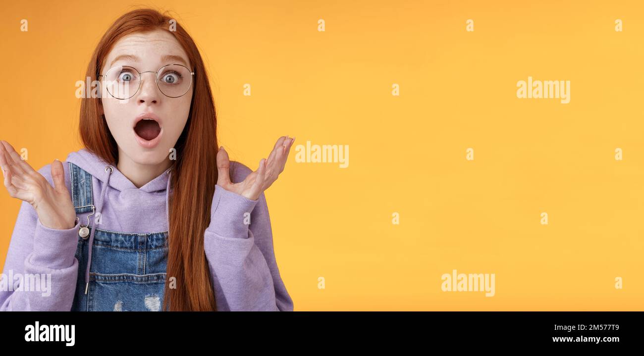 Close-up shocked sensitive concerned young panicking redhead woman ...