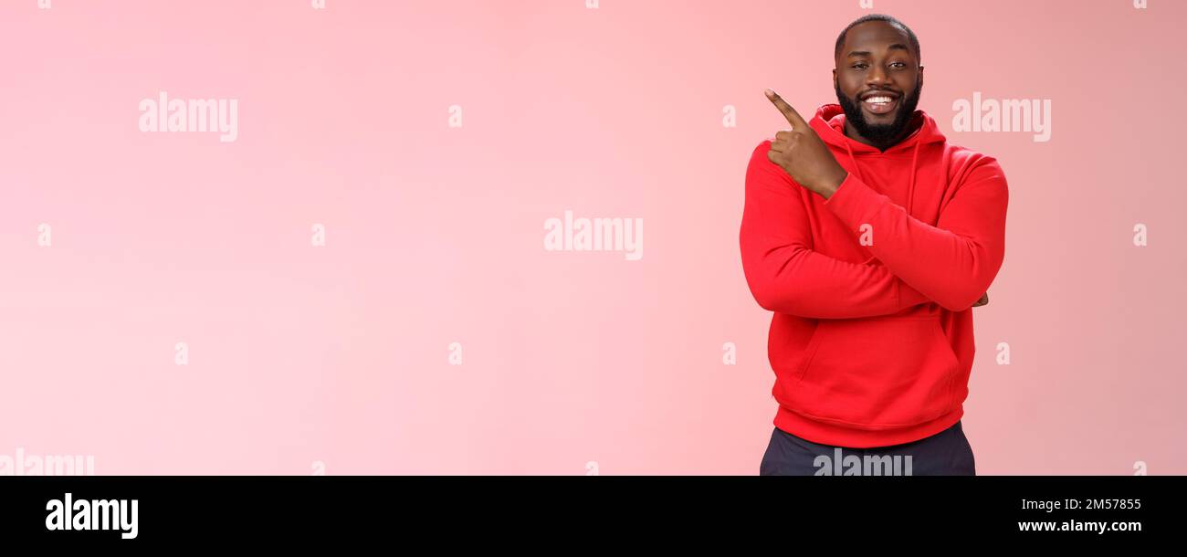 Cheeky outgoing smiling attractive african-american male model in red ...