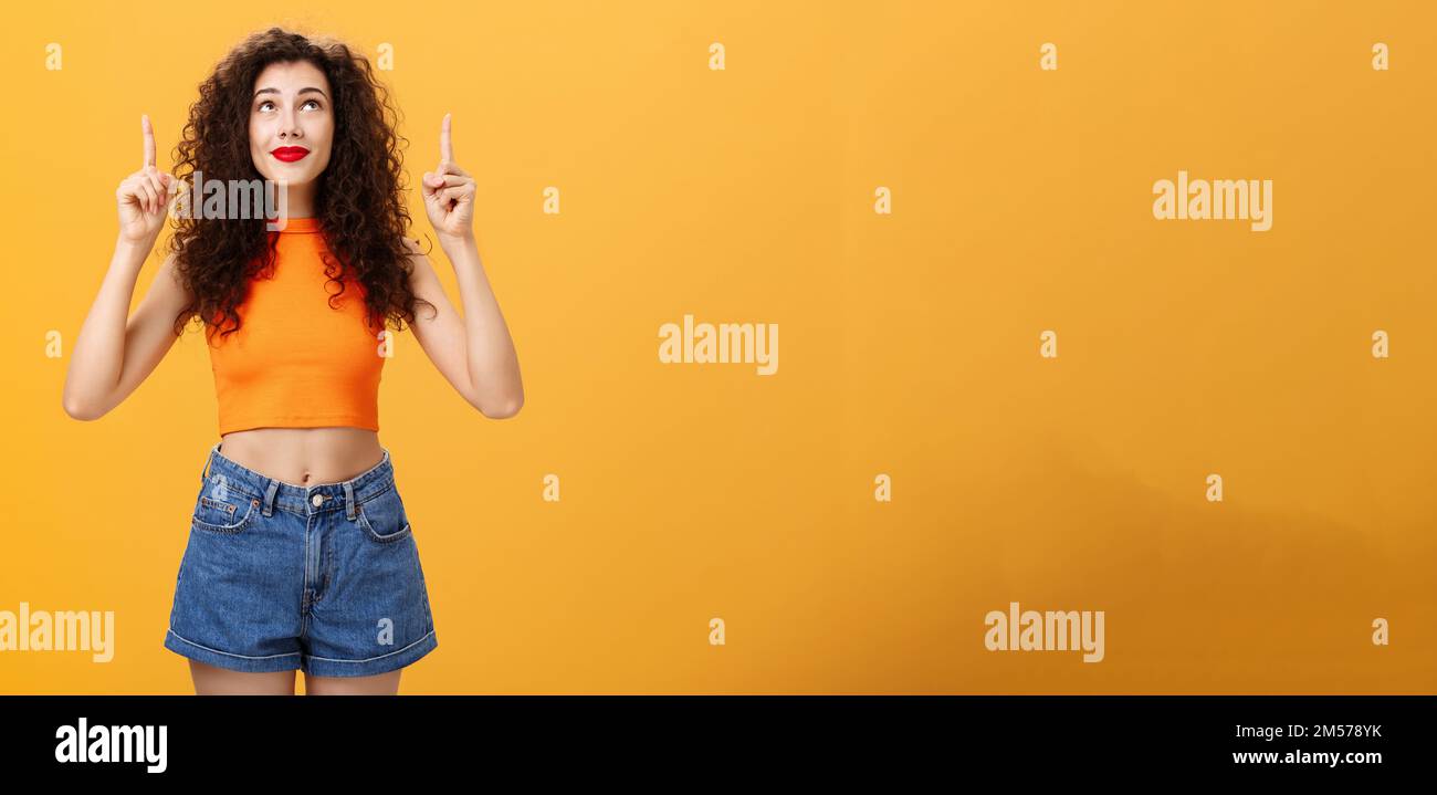 Woman wishing on shooting start believing in miracle looking and ...