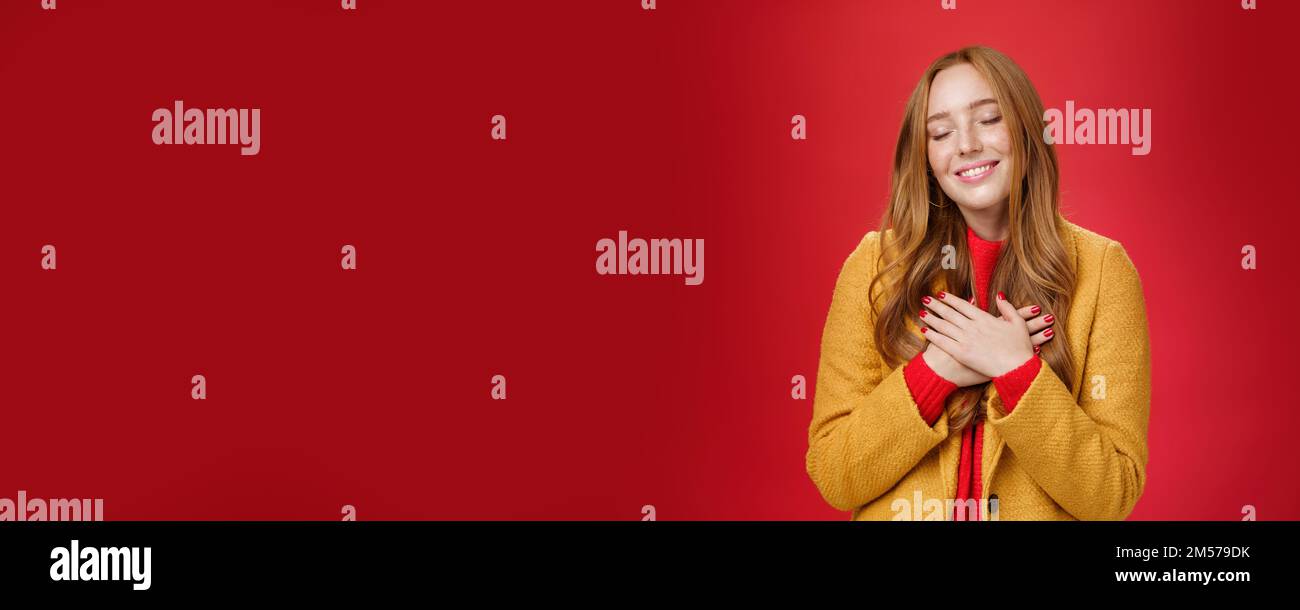 Girl feeling like heart warming as remembering sweet tender memories ...