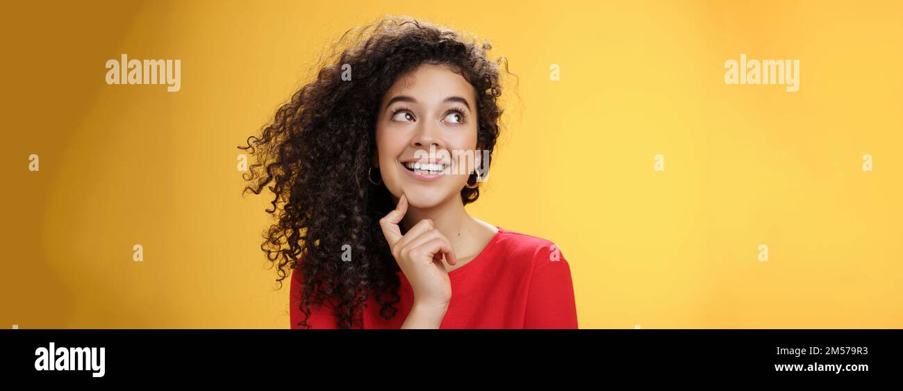 Dreamy girl making assumptions what gets as christmas present looking ...