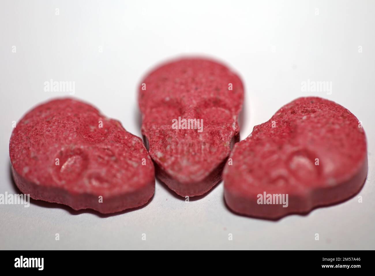Purple skull world's strongest ecstasy pills close up background high ...