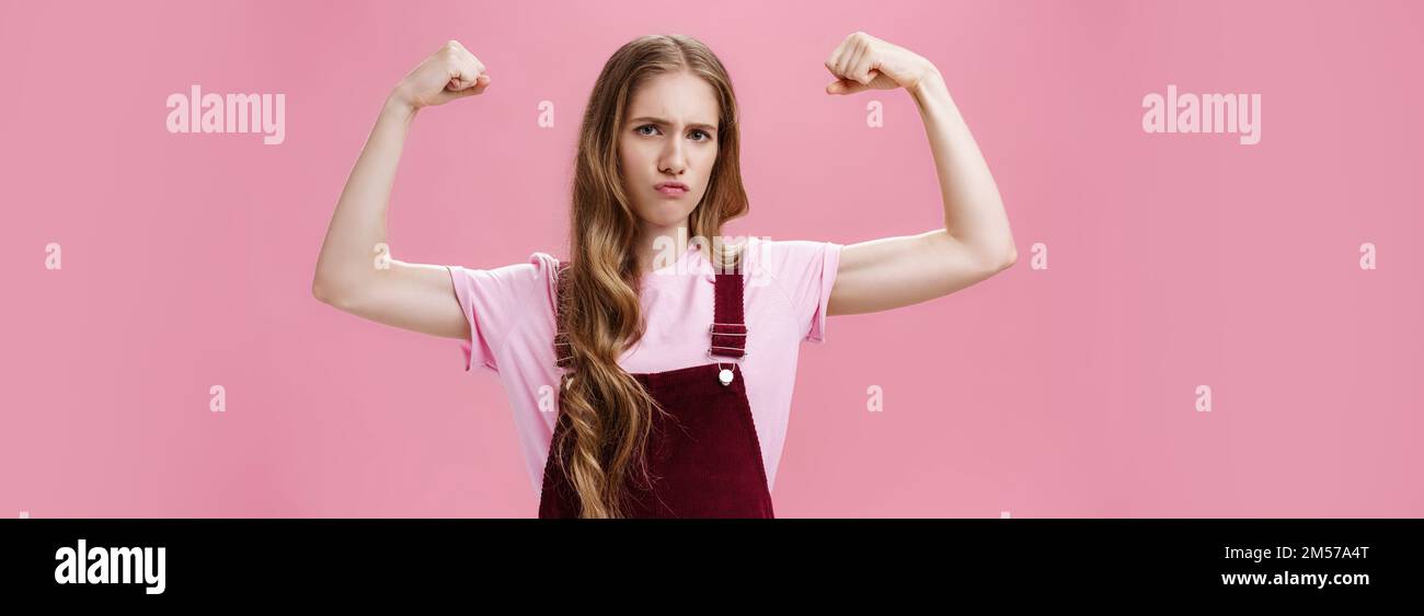 Girl shows she strong and independent. Serious-looking confident ...