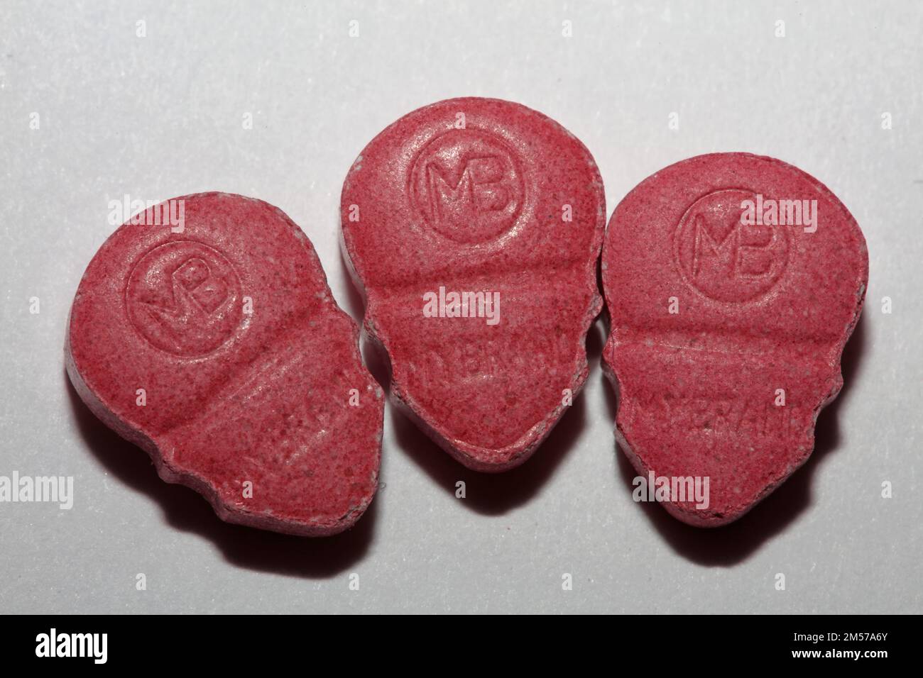 Purple skull world's strongest ecstasy pills close up background high ...