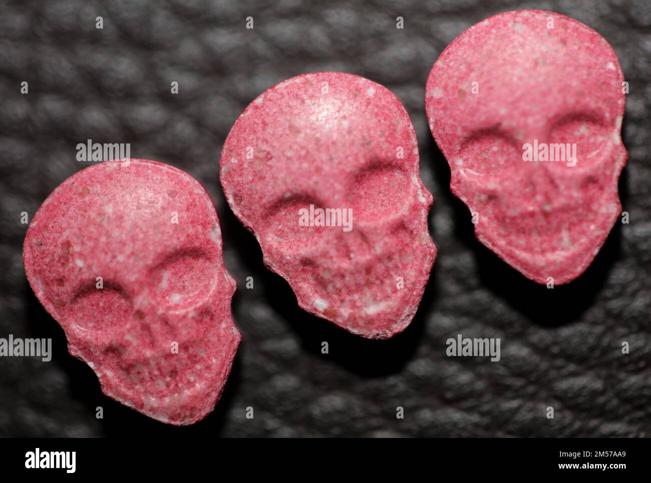 Purple skull world's strongest ecstasy pills close up background high ...