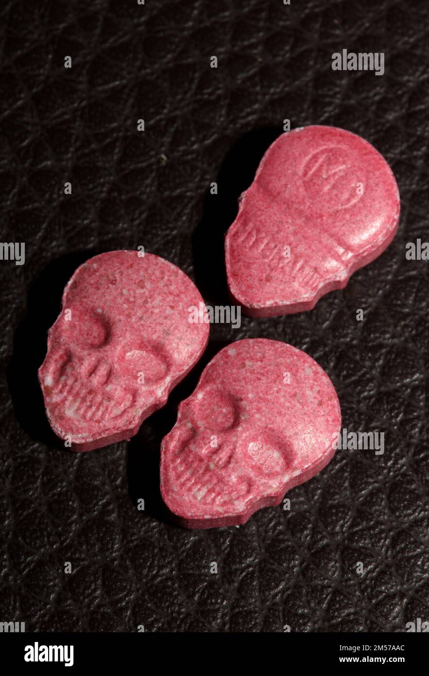 Purple skull world's strongest ecstasy pills close up background high ...