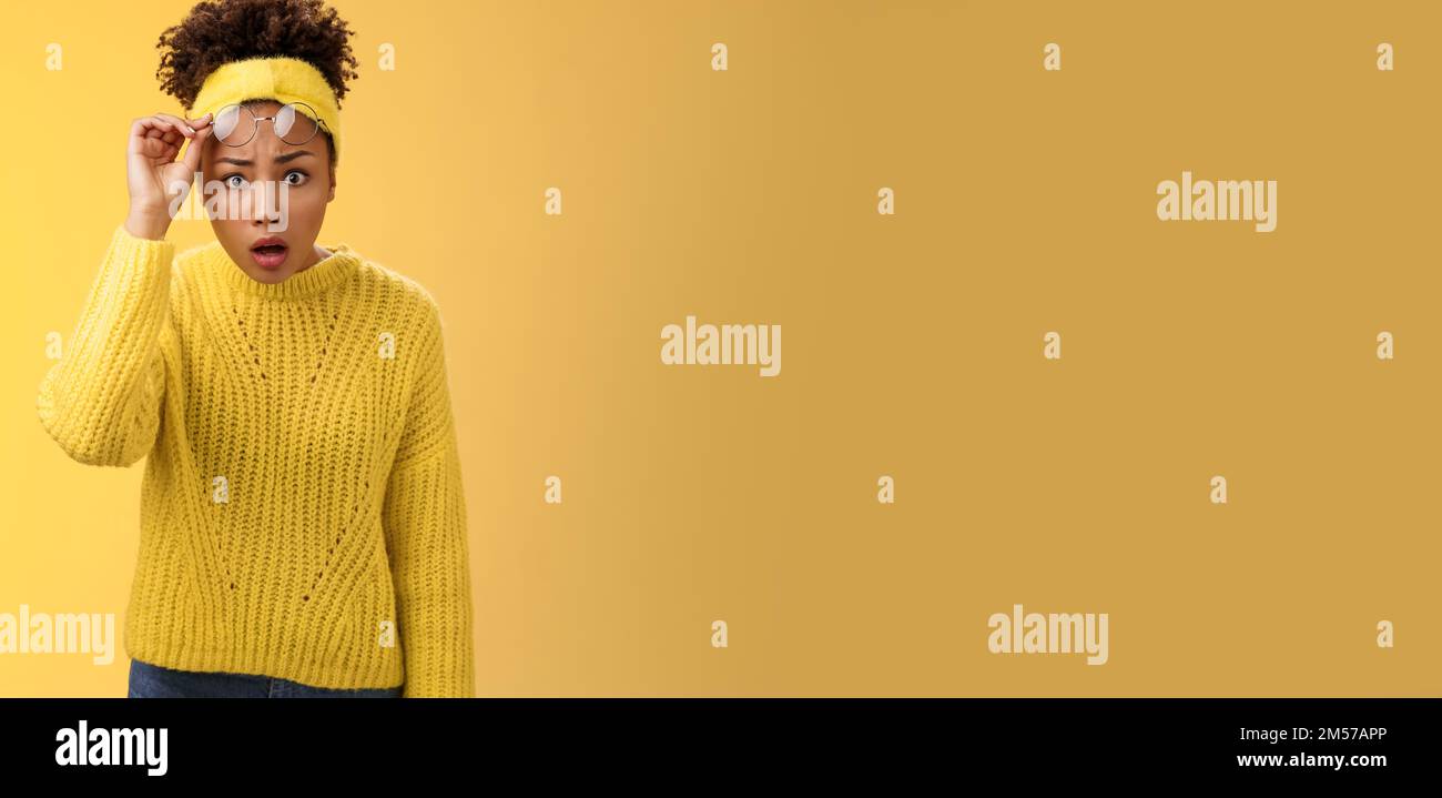 Concerned amazed speechless african-american student girl drop jaw take ...