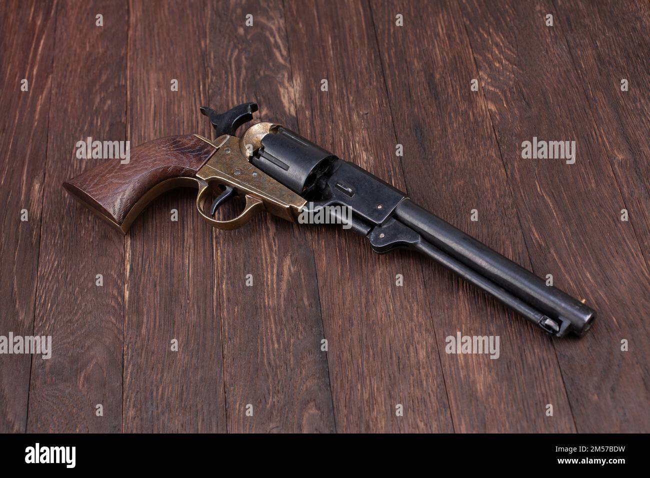Old West gun - Percussion Army Revolver on wooden table Stock Photo - Alamy