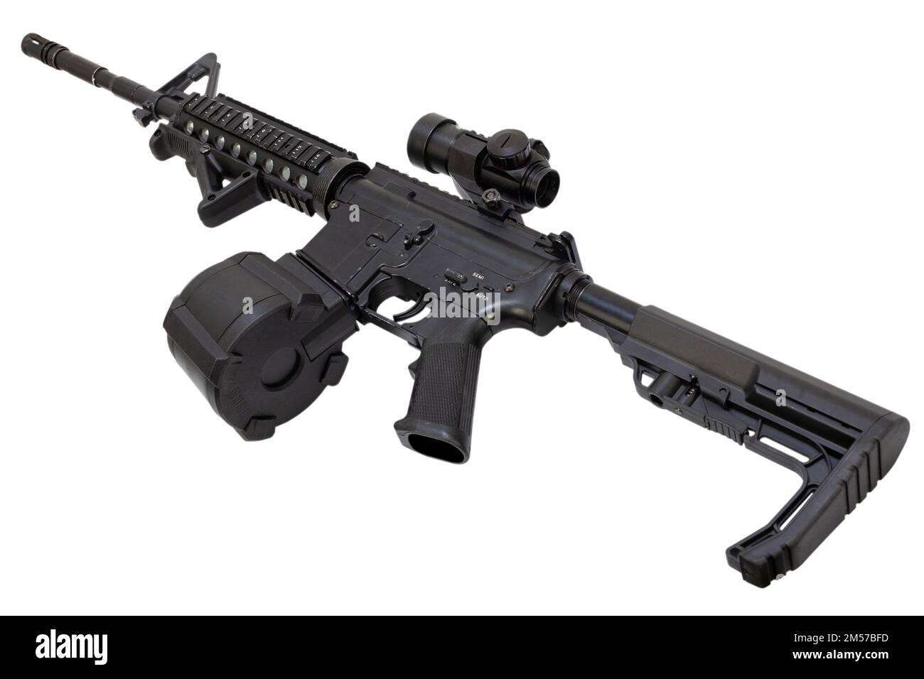M4 assault rifle with optic scope and drum magazine isolated on a white ...