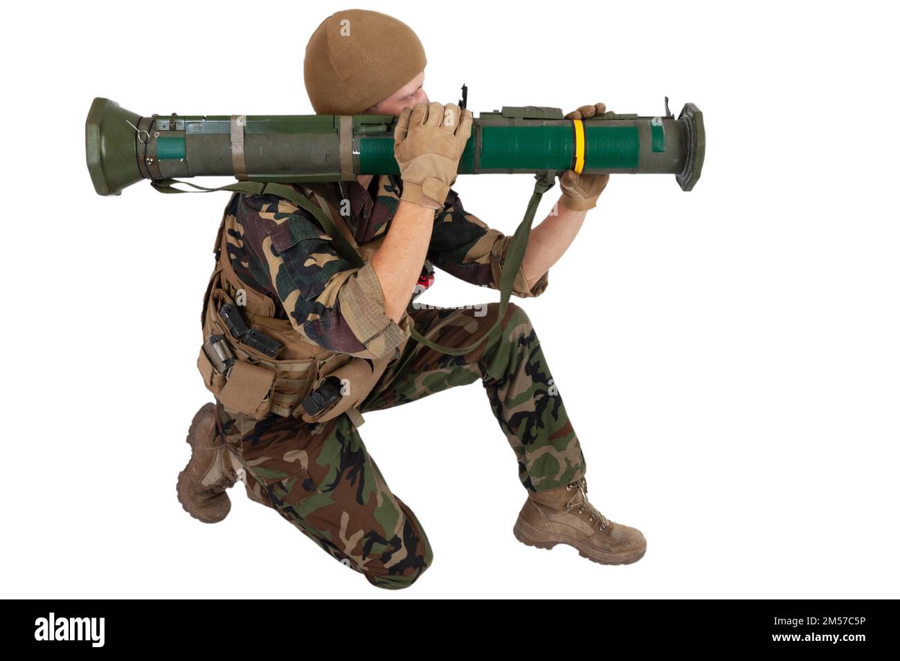 Mecenary operator fire AT4 bazooka rocket launcher isolated on white ...