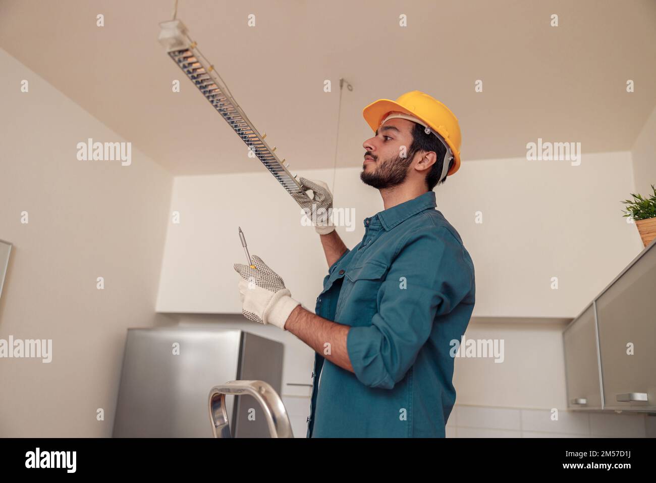 Installing electric equipment hi-res stock photography and images - Alamy